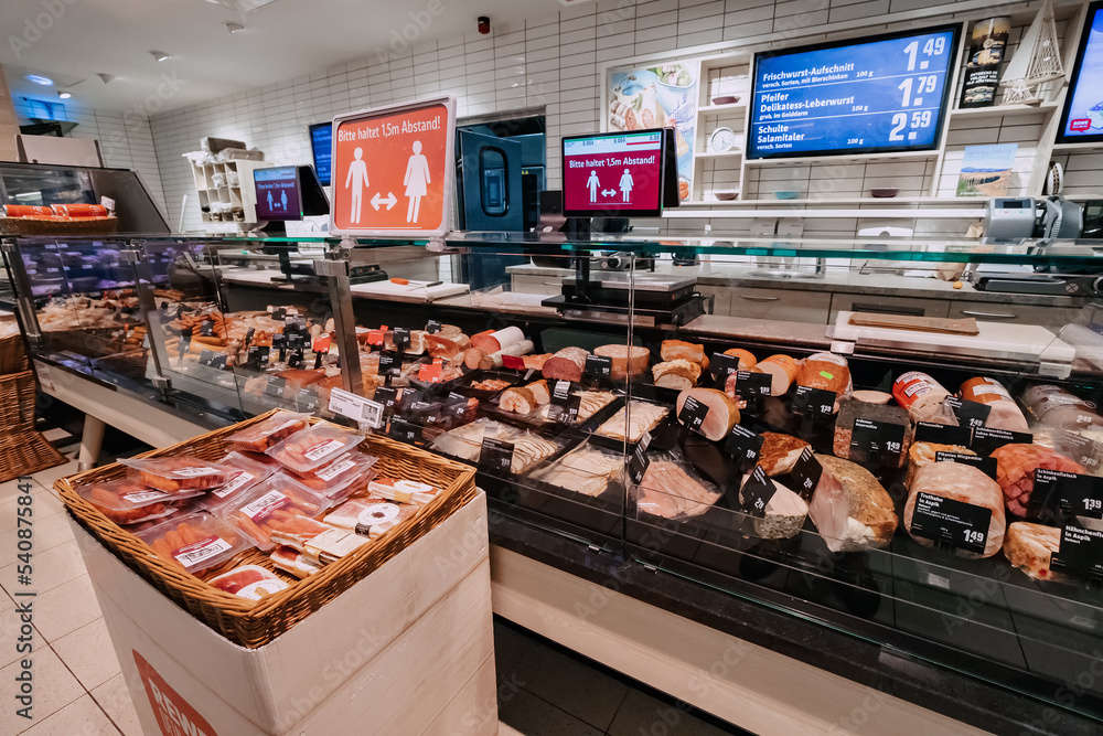 25 July 2022, Munster, Germany: sausages and assortment of meat for ...