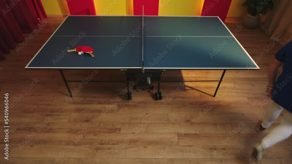 Funny young man after he win the ping pong game get very excited and ...