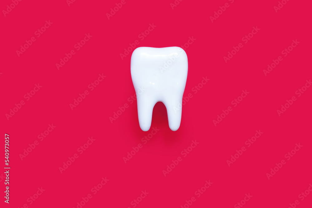 A molar on a pink background in the center of the image. Medical ...