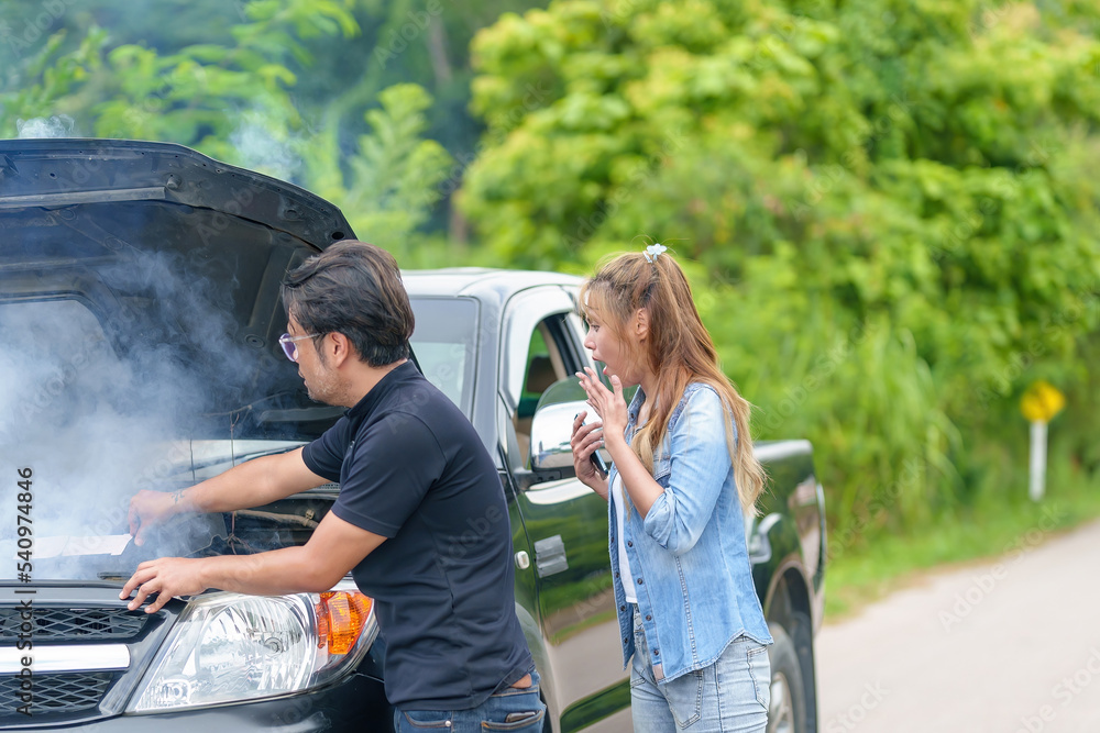 Road victims are shocked after an accident with smoking a car engine ...