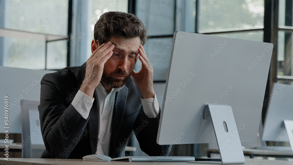 Tired Caucasian bearded 40s middle-aged businessman employee man typing ...