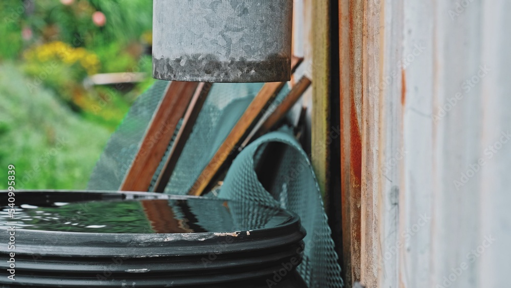 Drops of Water Dripping from Plastic Gutter into Overflowing Plastic ...