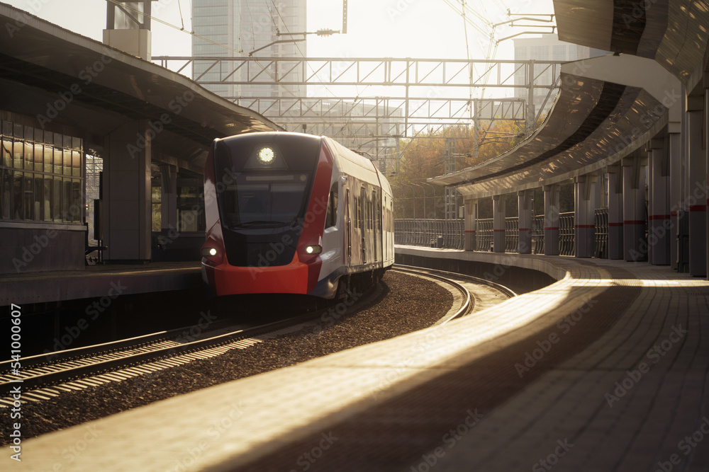 City train drive on railroad at the platform train station ...