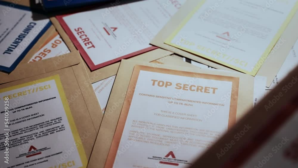 Vidéo Stock Manila folders with different security clearance labels for ...