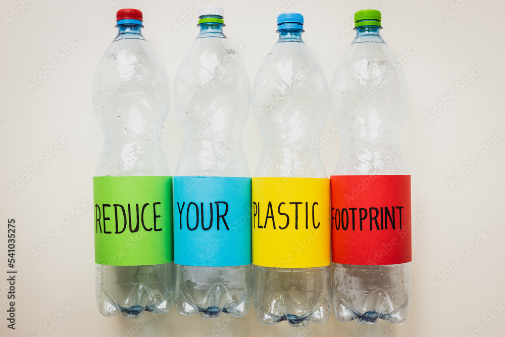 Reduce Your plastic footprint, Handwritten plastic bottles ...