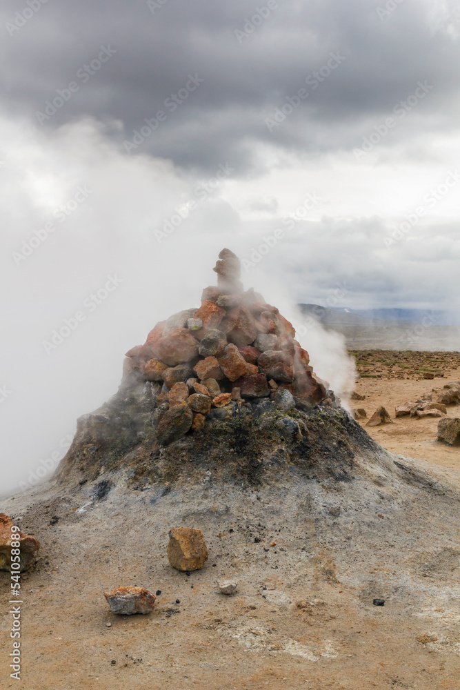 smoking stone heaps at the geothermal area of Hverarönd Stock Photo ...