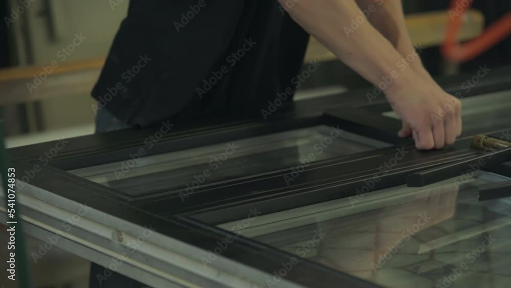 Hand-Crafted Window Production By Skilled Worker Attaching Black Wooden ...
