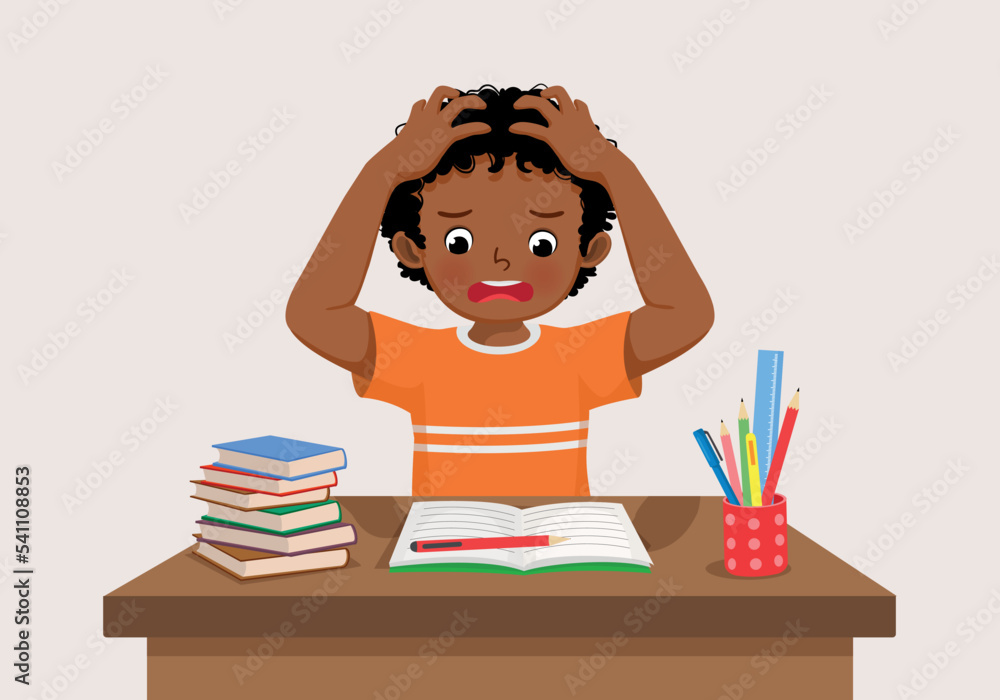 cute little African boy feeling stress tired and bored studying doing ...