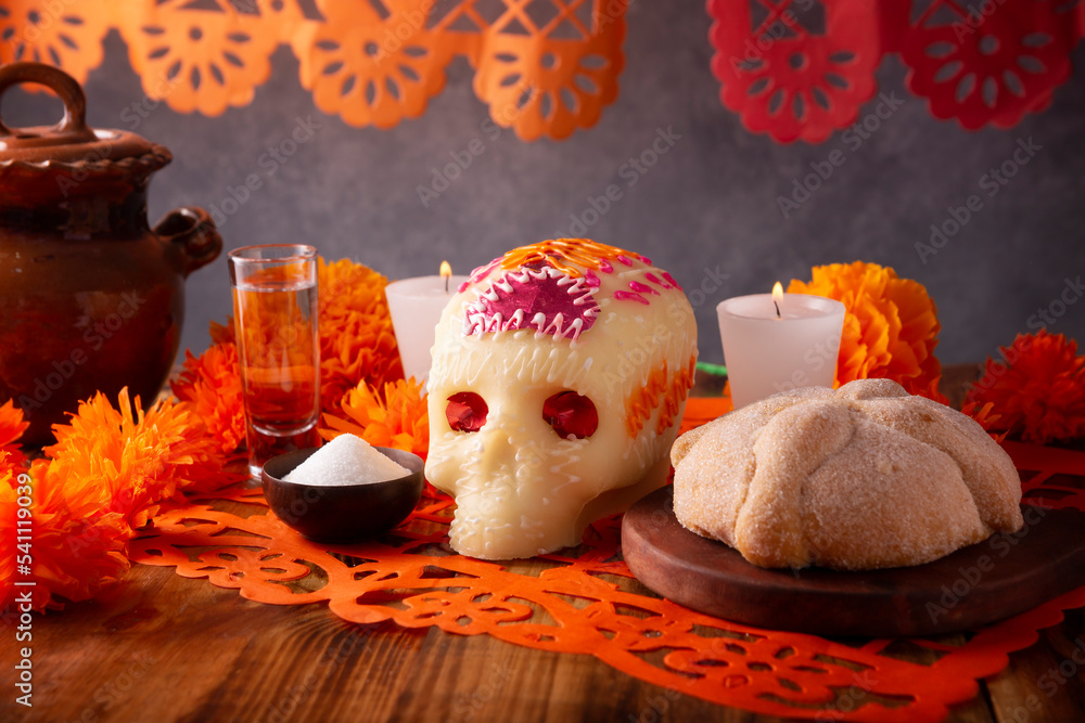 Pan de Muerto with sugar skull and Cempasuchil flowers or Marigold and ...