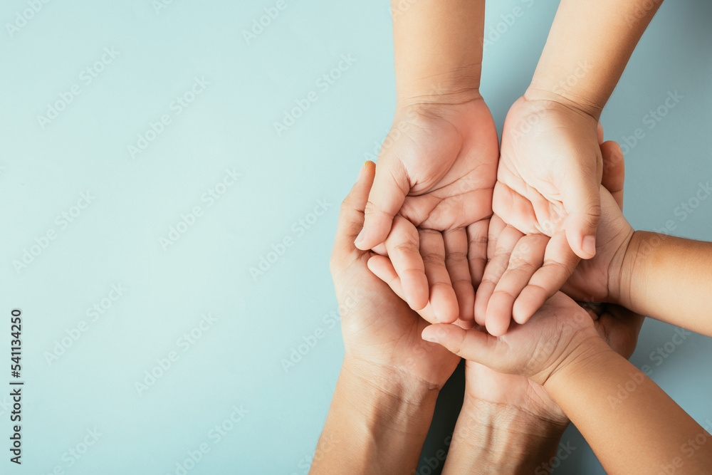 Top view parents and little kid holding empty hands together studio ...