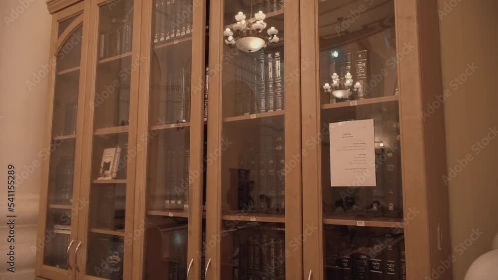 Modern Jewish library in Synagogue. Bookshelves with volumes ...