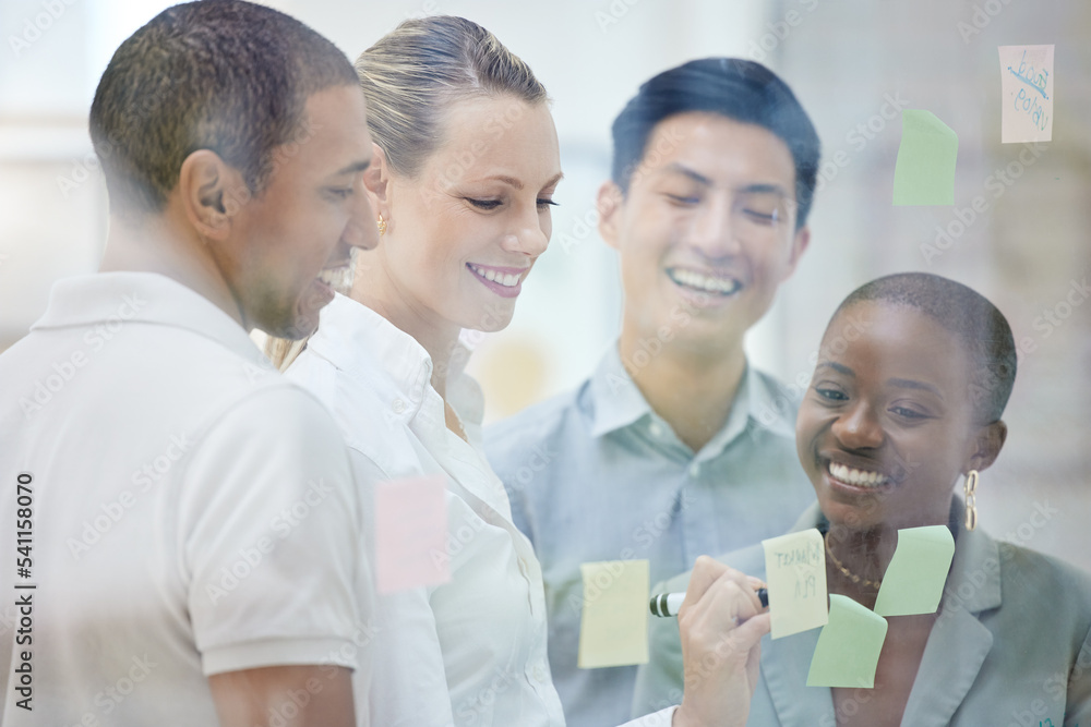 Teamwork, sticky note and collaboration while writing idea and ...