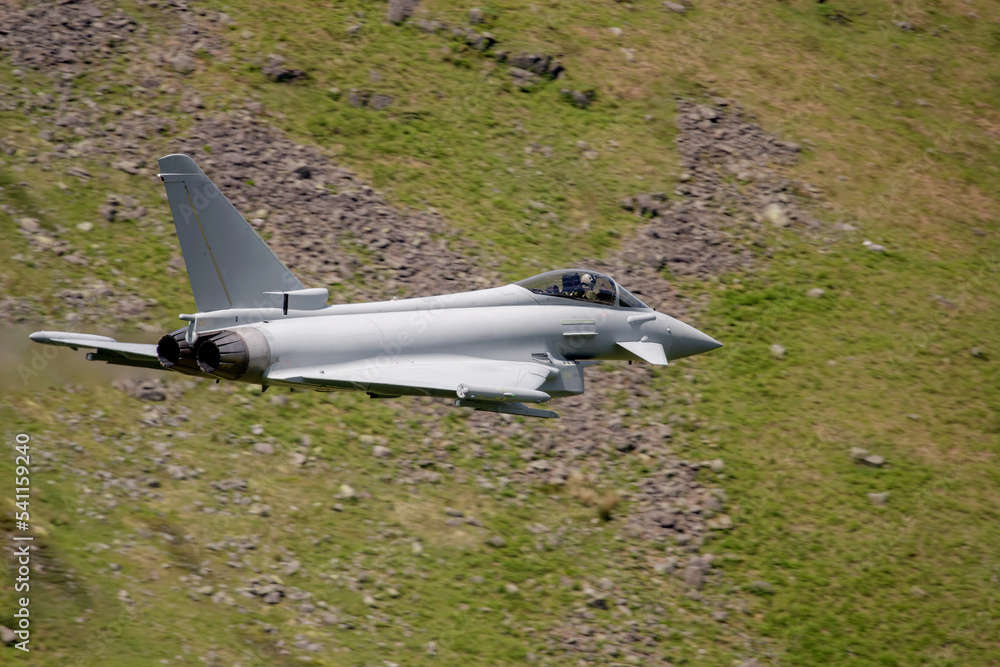 British Aerospace Typhoon Fighter jet flying fast low level in the ...