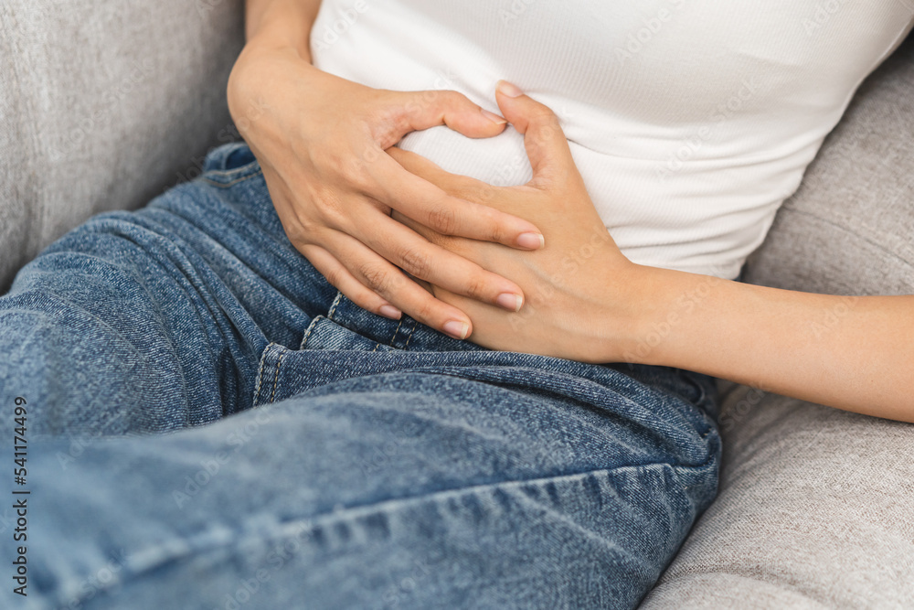 Poster Flatulence asian young woman, girl hand in stomach ache, suffer ...