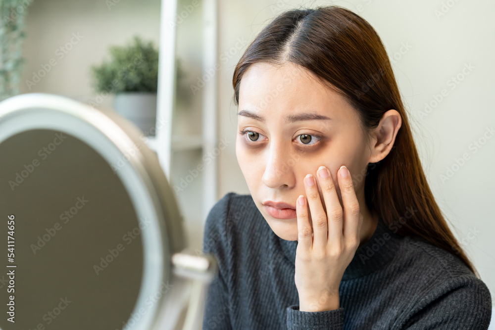 Bored, insomnia asian young woman, girl looking at mirror hand touching ...