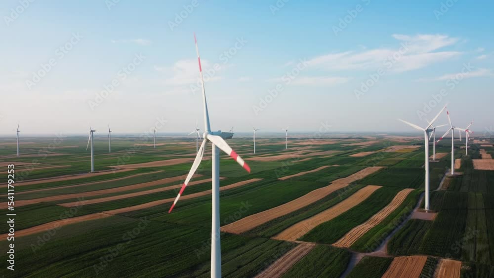 Windmill farm park and turbines for producing green electricity. Drone ...