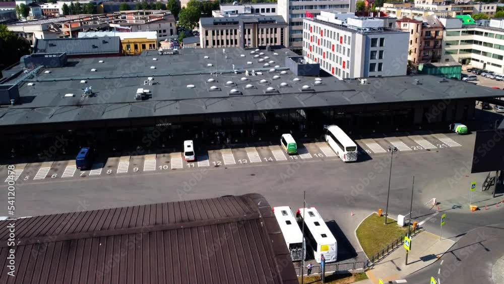 Aerial view of bus station parking and the building rooftops in Kaunas ...