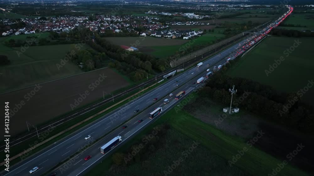 Dense traffic and traffic jam on a highway at dusk - aerial view Stock ...