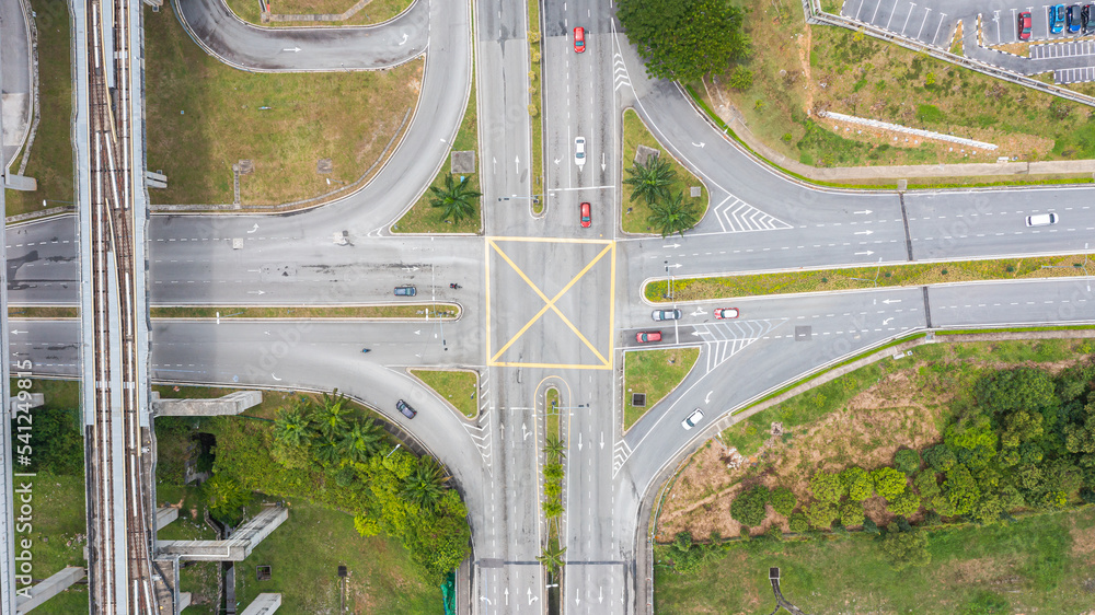 Traffic junctions, modern city. View from above to busy road junction ...