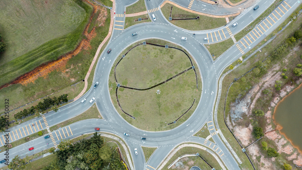 Aerial top down view of traffic roundabout on a main road. Aerial view ...