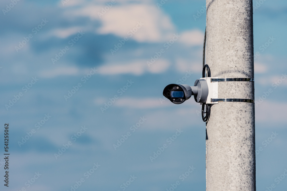 CCTV installed on pillar in a public space to monitor suspicious ...
