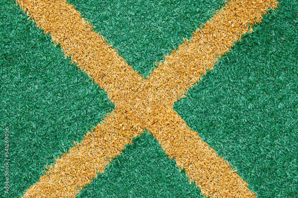 yellow markings on the green football field. football game concept ...