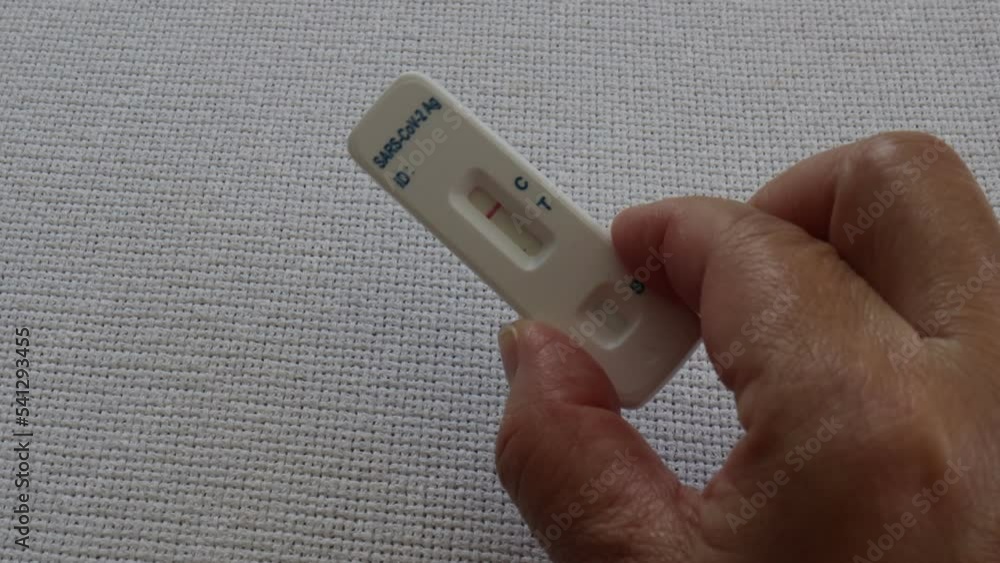 Rapid Sars-Cov-2 Ag antigen test to detect covid 19 on table with a ...