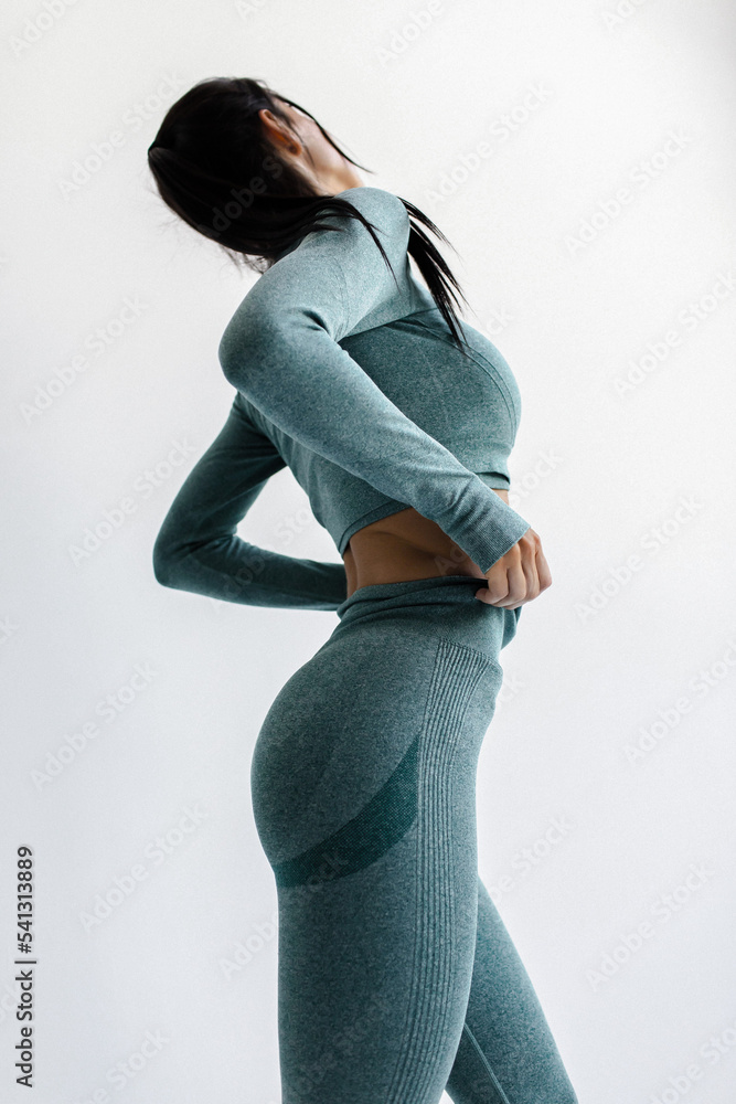 Fitness woman stretching full body. Fitness woman standing stretching ...