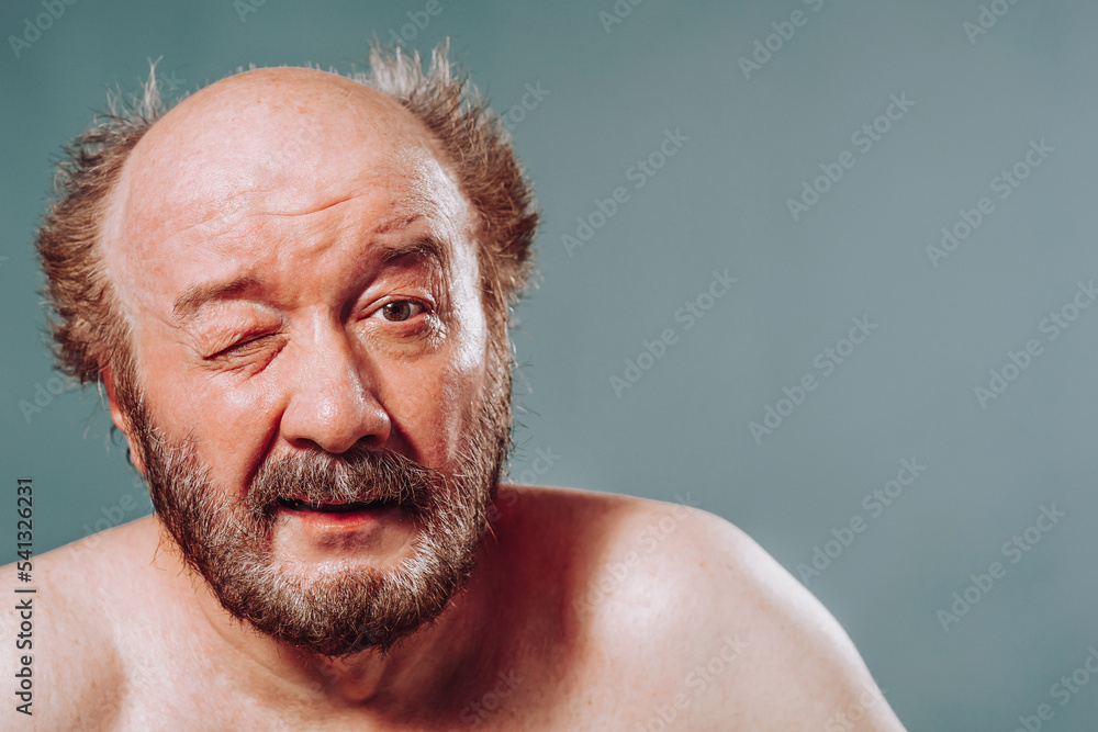 Front view is a funny portrait of an elderly man with a beard, mustache ...