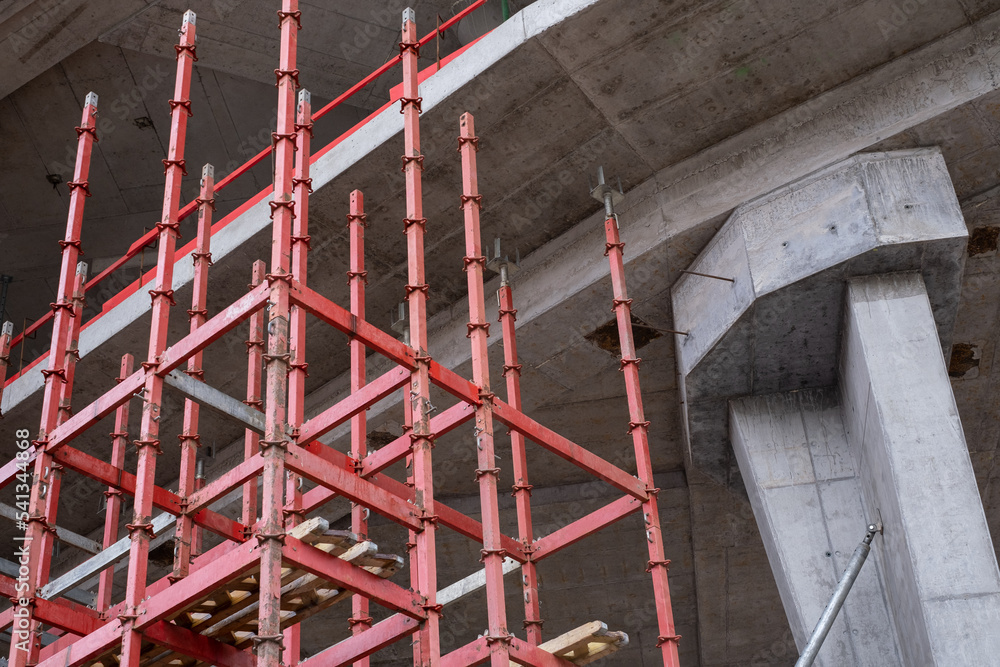 Scaffolding at the beginning on the construction site. Assembled ...