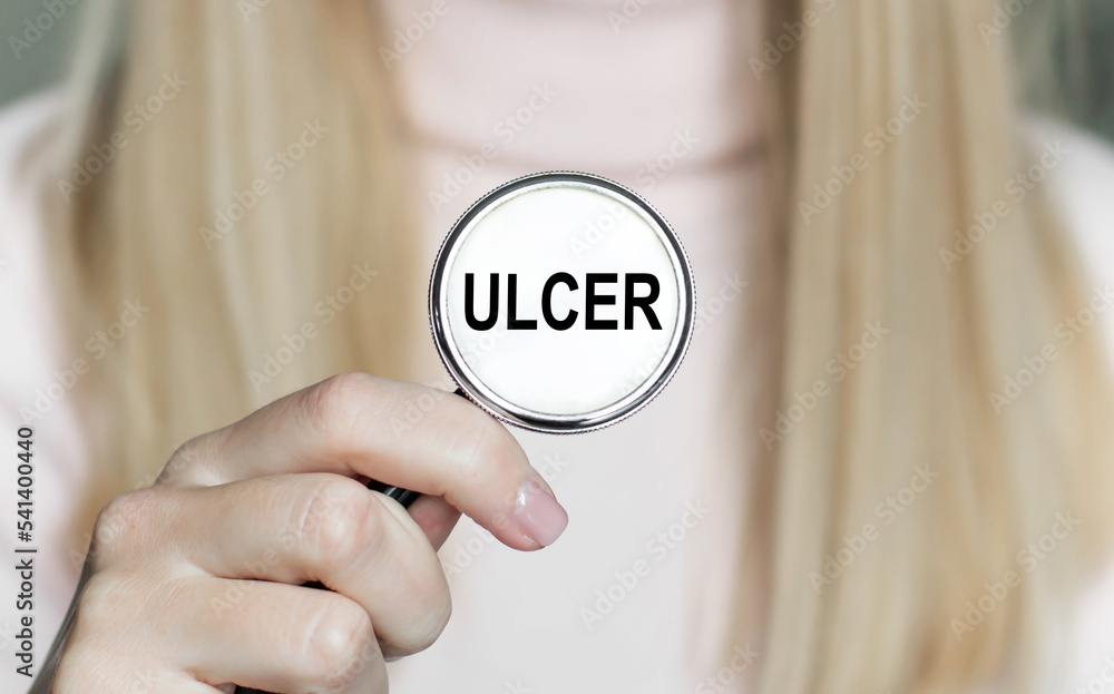 Medical and stomach ulcer symbol. Doctor hand. A stethoscope with the ...