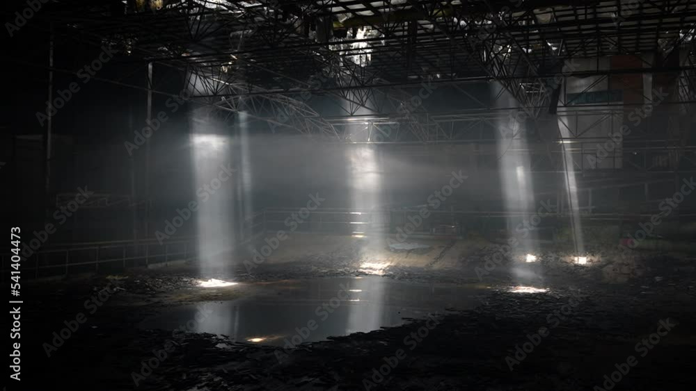 Sunlight shining and smoke throuh the windows of an old abandoned ...