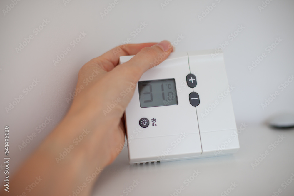 hand holding thermometer showing temperature in the room. Extreme hot ...