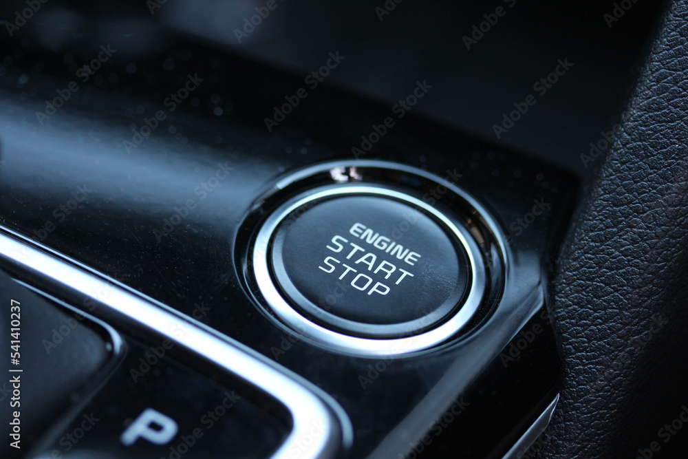 Engine start stop button in a new vehicle Stock Photo | Adobe Stock