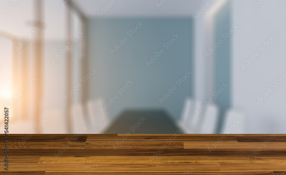 Front view of an office interior with a row of dark wood tables ...