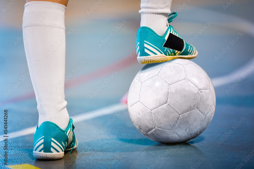 Feet Of White Team Indoor Soccer Player Tread On Soccer Ball For Kick ...