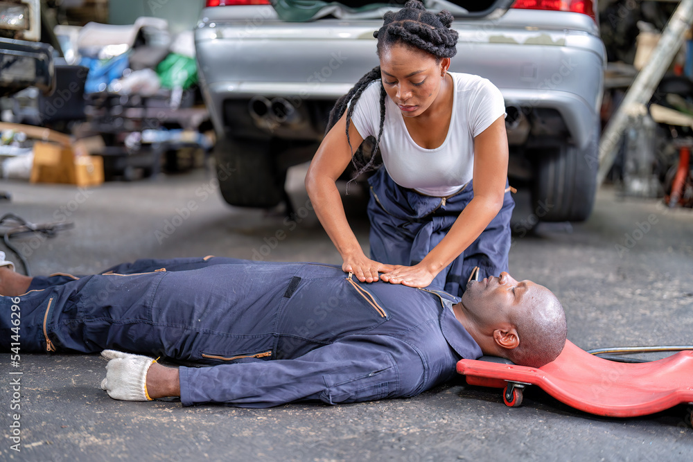 Mechanical guy at car repair shop got accident lay on the floor ...