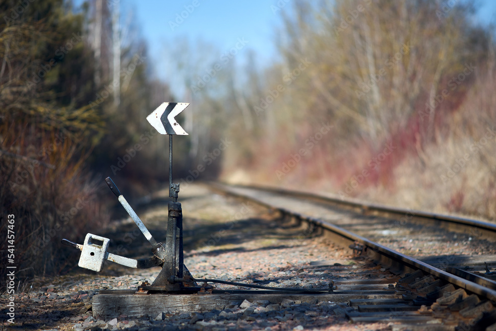 Hand-operated railroad switch with lever signal weight. Old railroad ...