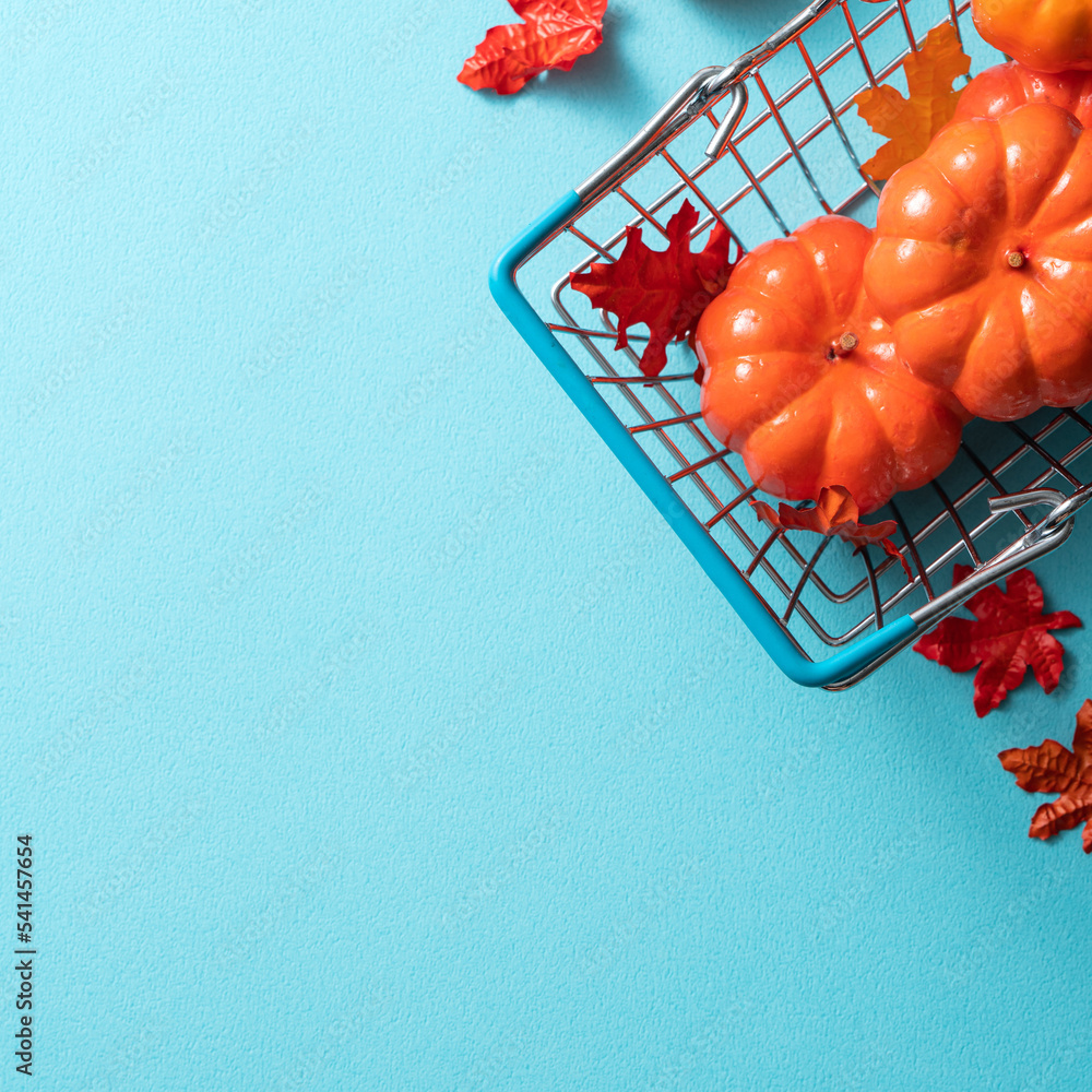 Autumn shopping design concept background with shopping cart, maple ...