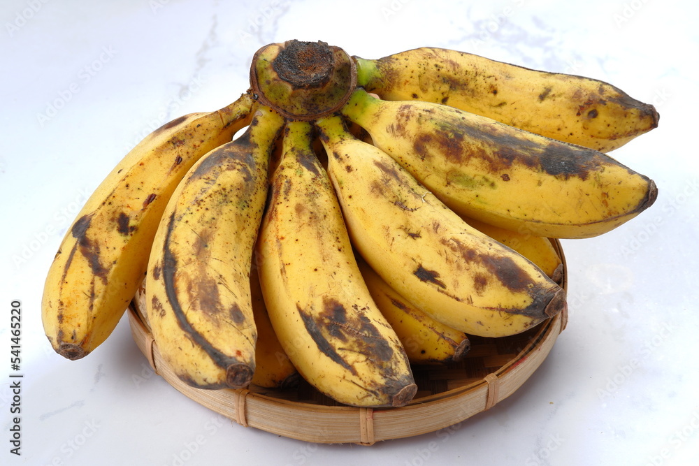 banana or pisang raja bulu.bananas their peak of ripeness with brown ...