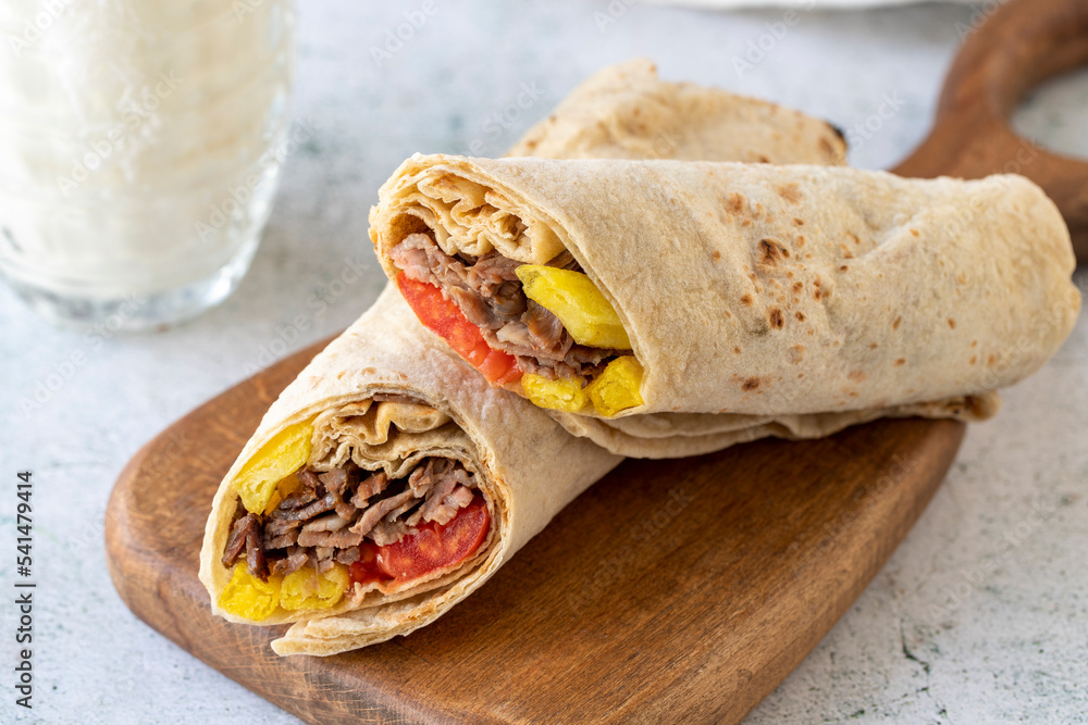 Turkish meat doner wrap on gray background. Traditional flavors. Doner ...