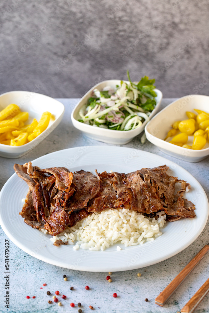Meat doner with rice on gray background. Traditional flavors. Doner ...