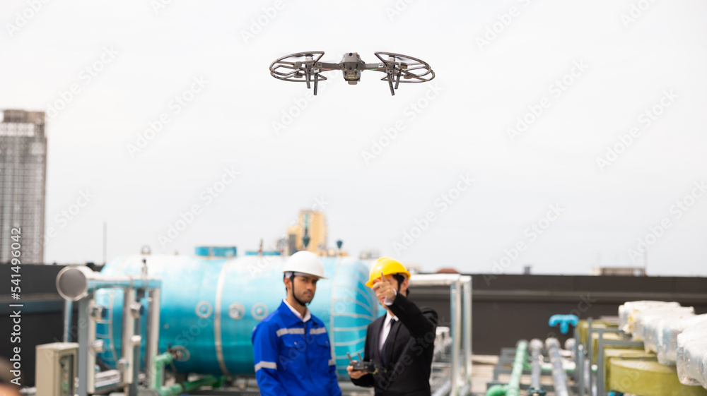 Professional inspection engineering use drone for survey building under ...