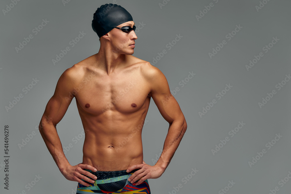 Portrait of a swimmer in a cap and mask, half-length portrait, young ...