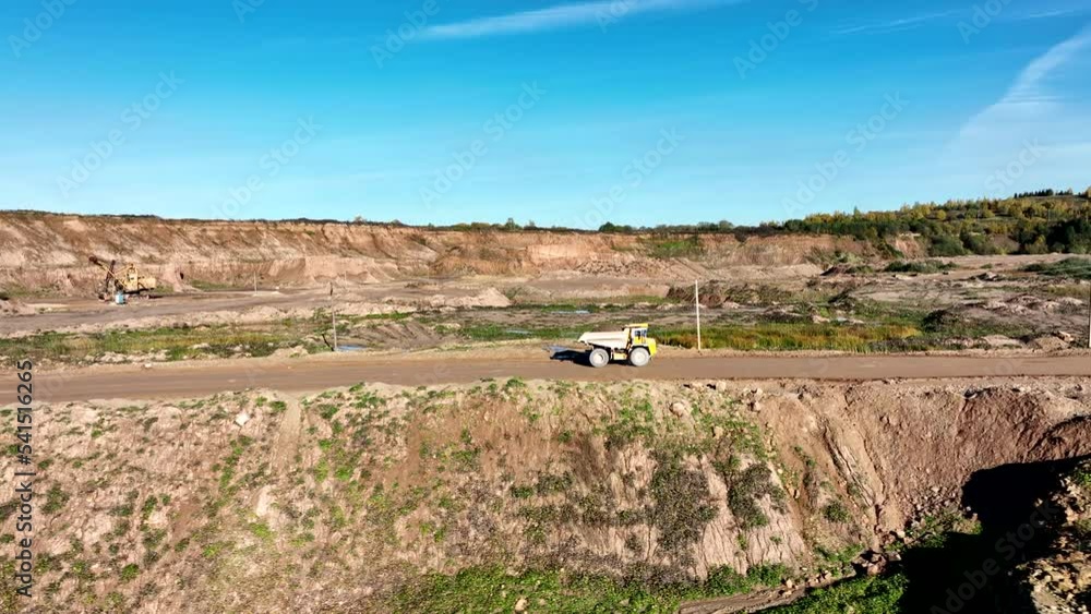 Mining truck transportation of loosened rock mass. Dolomite rock in ...