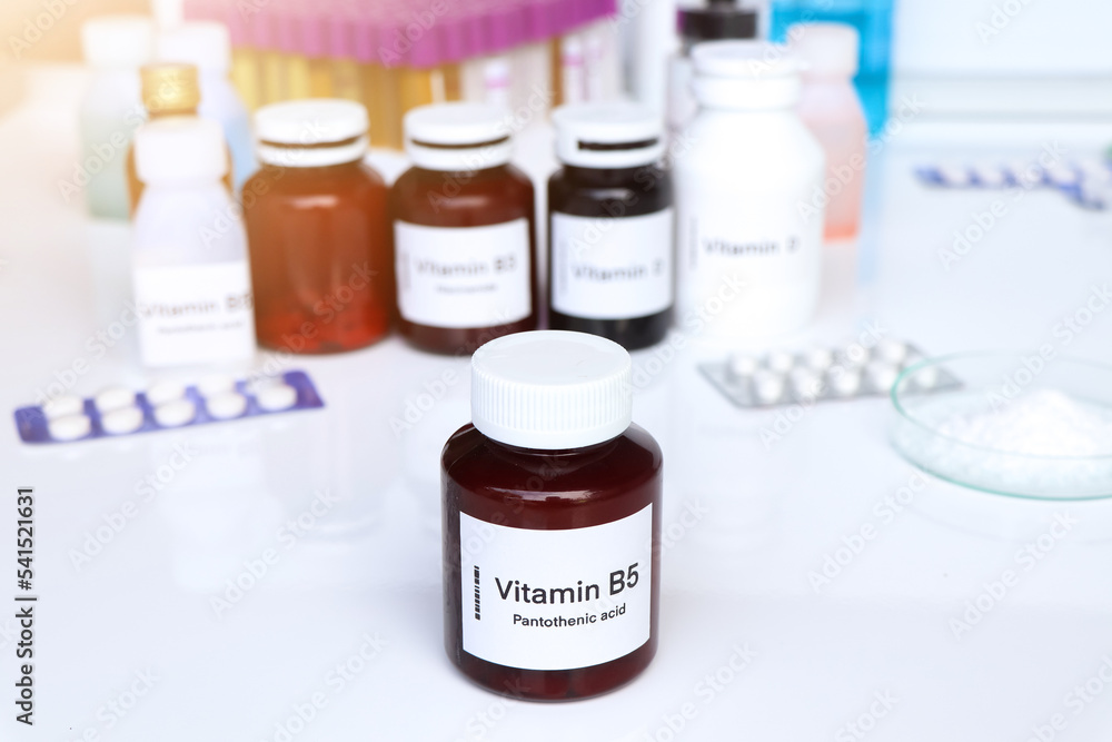 Vitamin B5 pills in a bottle, food supplement or used to treat disease ...