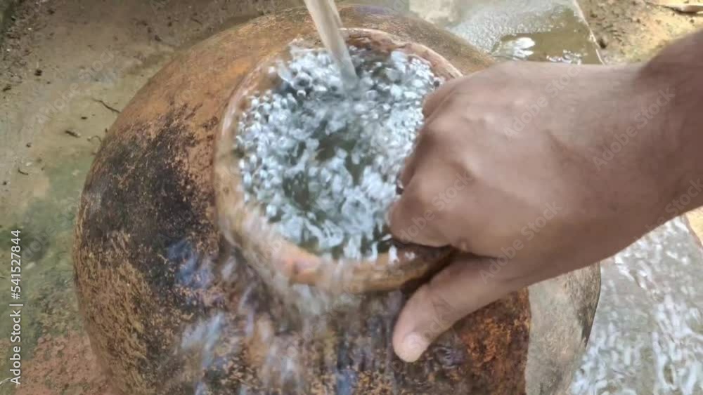 Ethiopian woman hand collecting or storing old traditional round ...