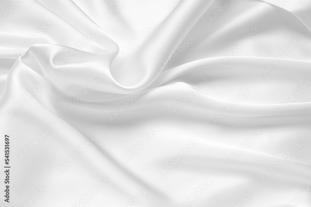 Smooth elegant white silk or satin luxury cloth texture can use as ...