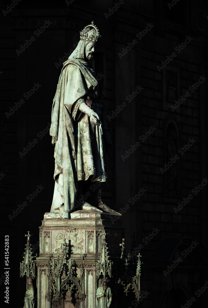Statue of Charles IV on black background in Prague, isolated in sun ...