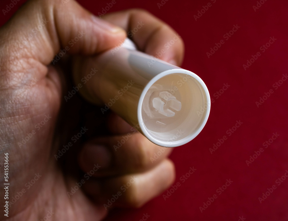 White plastic packaging used to store dermo cosmetics and for ...